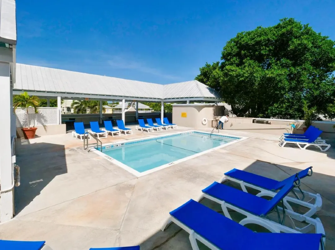 Balcony Overlooking Courtyard And Shared Pool Access - Charming Retreat - Key West, FL