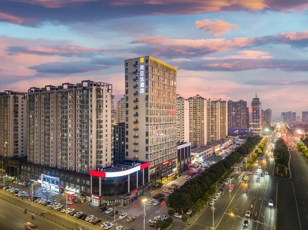 Xinyang Meiyada Hotel - Xinyang
