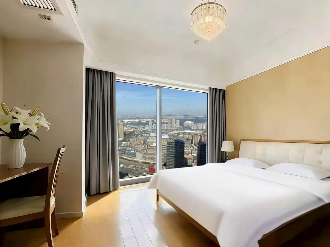 Xiaoxiang Mama Scenic Apartment - Dalian