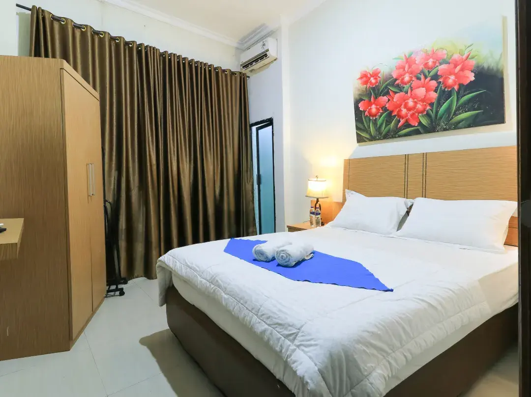 Labuana Homestay & Cafe Garden - Makassar