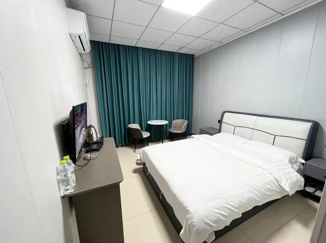Xinyu Business Hotel - Linyi
