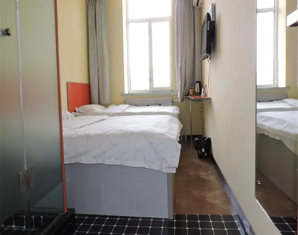 Qianli Express Hotel - Jiamusi