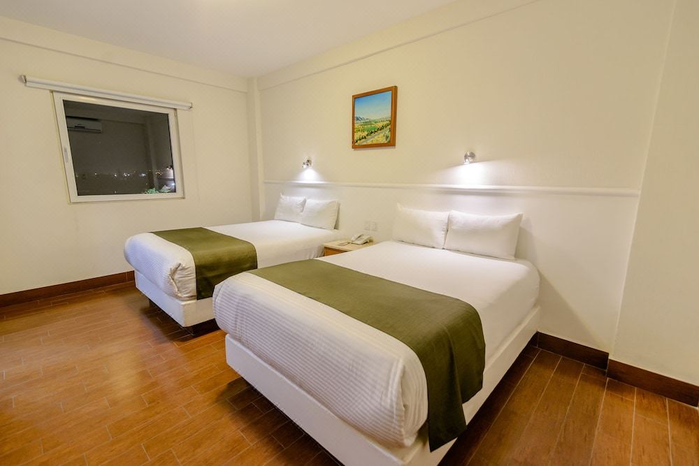 Hoteles Unico Express - León